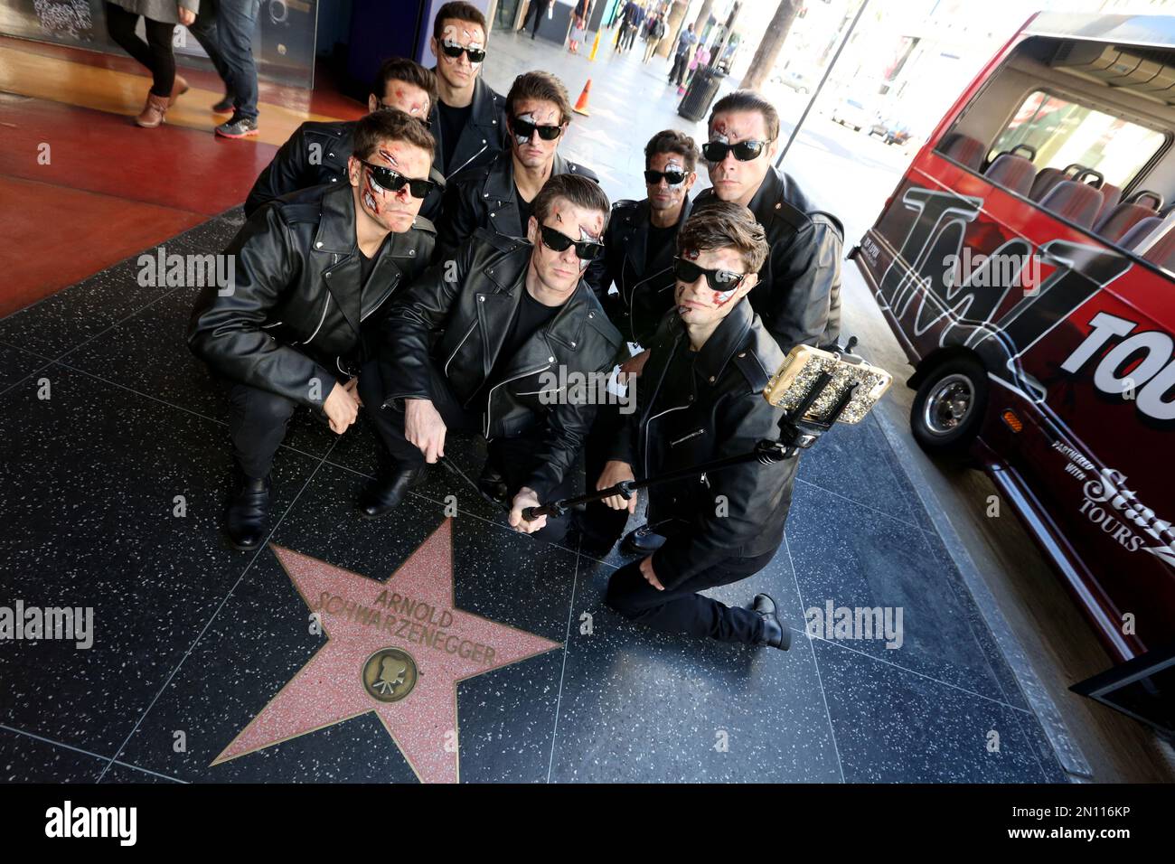 In this image distributed on Tuesday, Nov. 10, 2015 Terminators pose ...