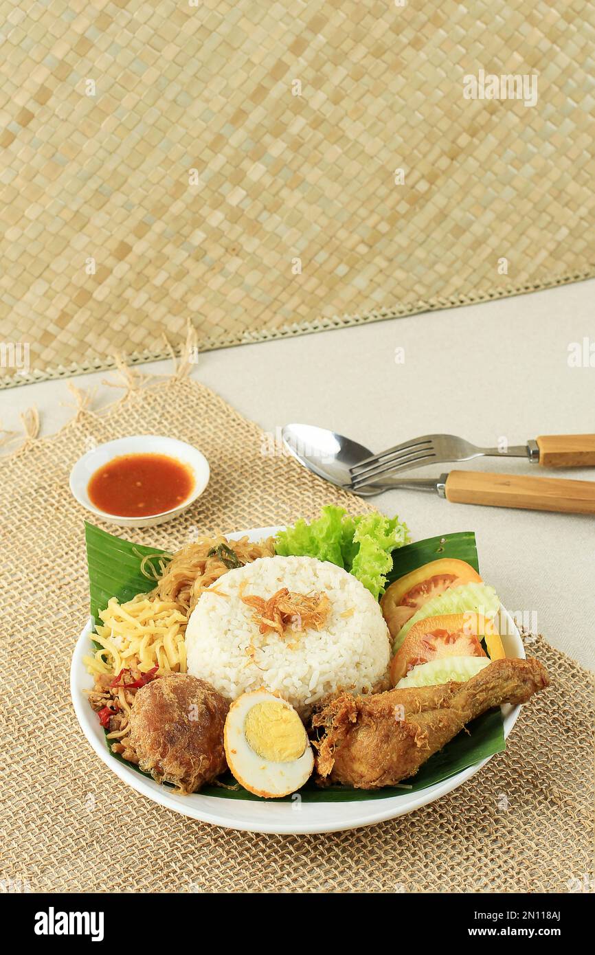 Nasi Uduk or Nasi Lemak, Steamed Rice with Various Side Dish, Chicken ...