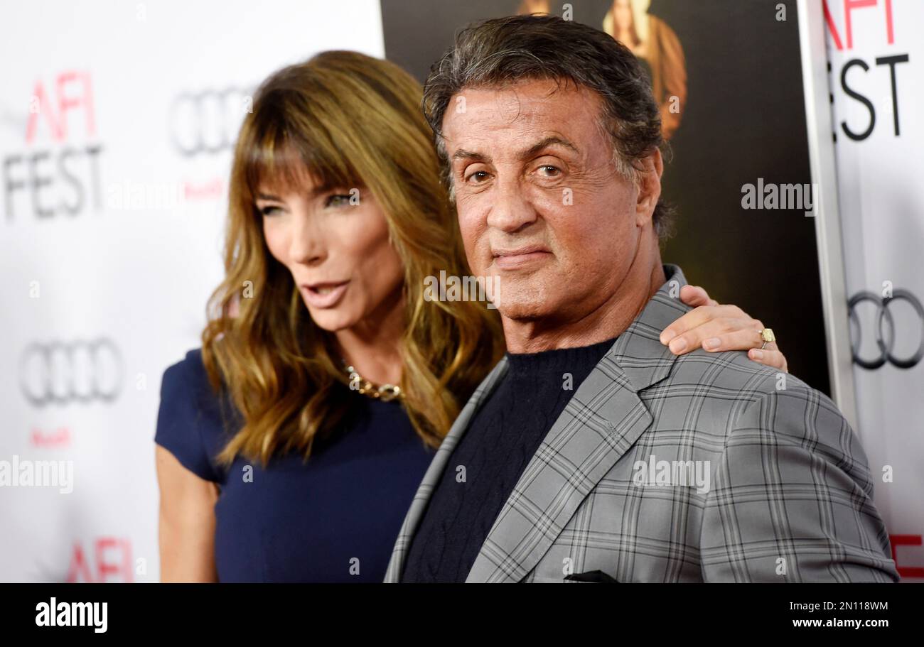 Sylvester Stallone, right, and his wife Jennifer Flavin pose together at a gala screening of the ...