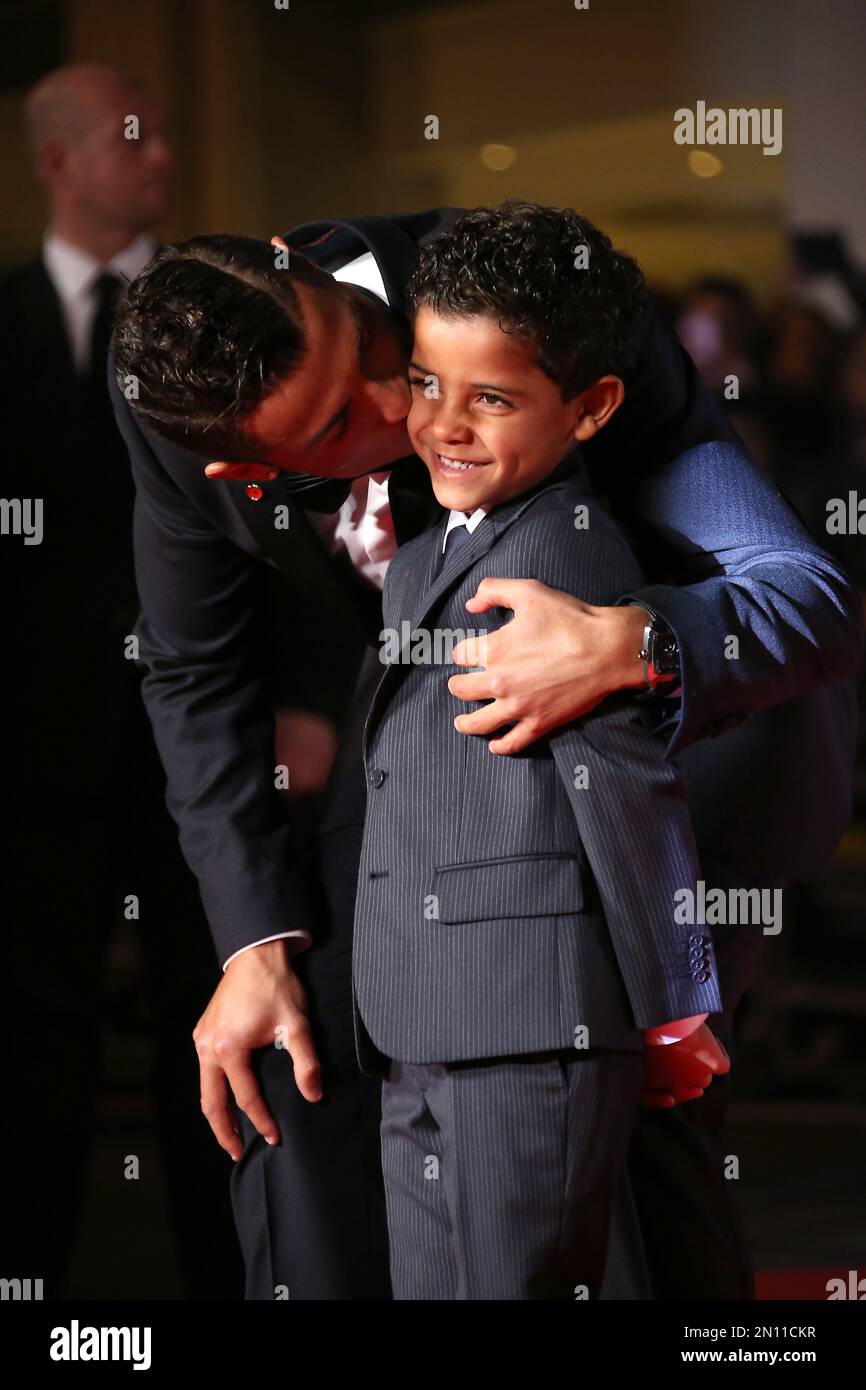 Cristiano Ronaldo, left, kisses his son Cristiano Ronaldo Junior as ...