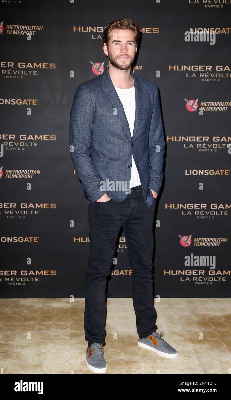 Australian actor Liam Hemsworth poses for photographers before the ...