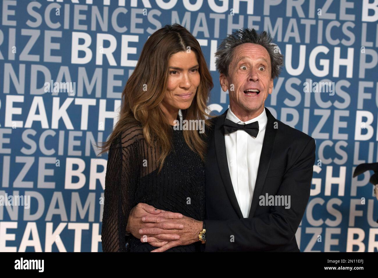 Veronica Smiley, left, and Brian Glaser arrive at the third annual ...