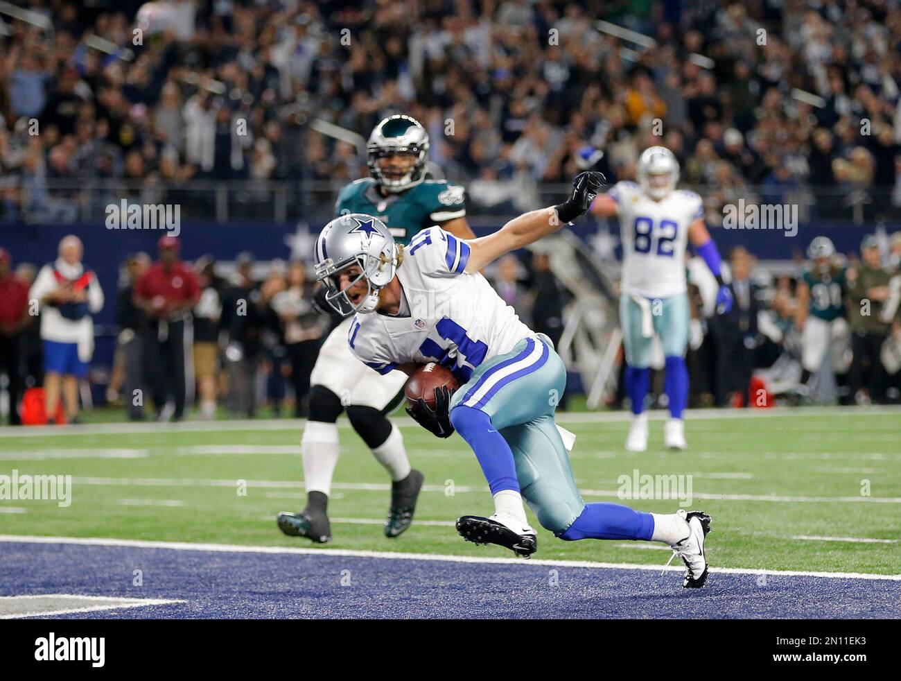 Dallas Cowboys' Cole Beasley (11) scores a touchdown after grabbing a ...