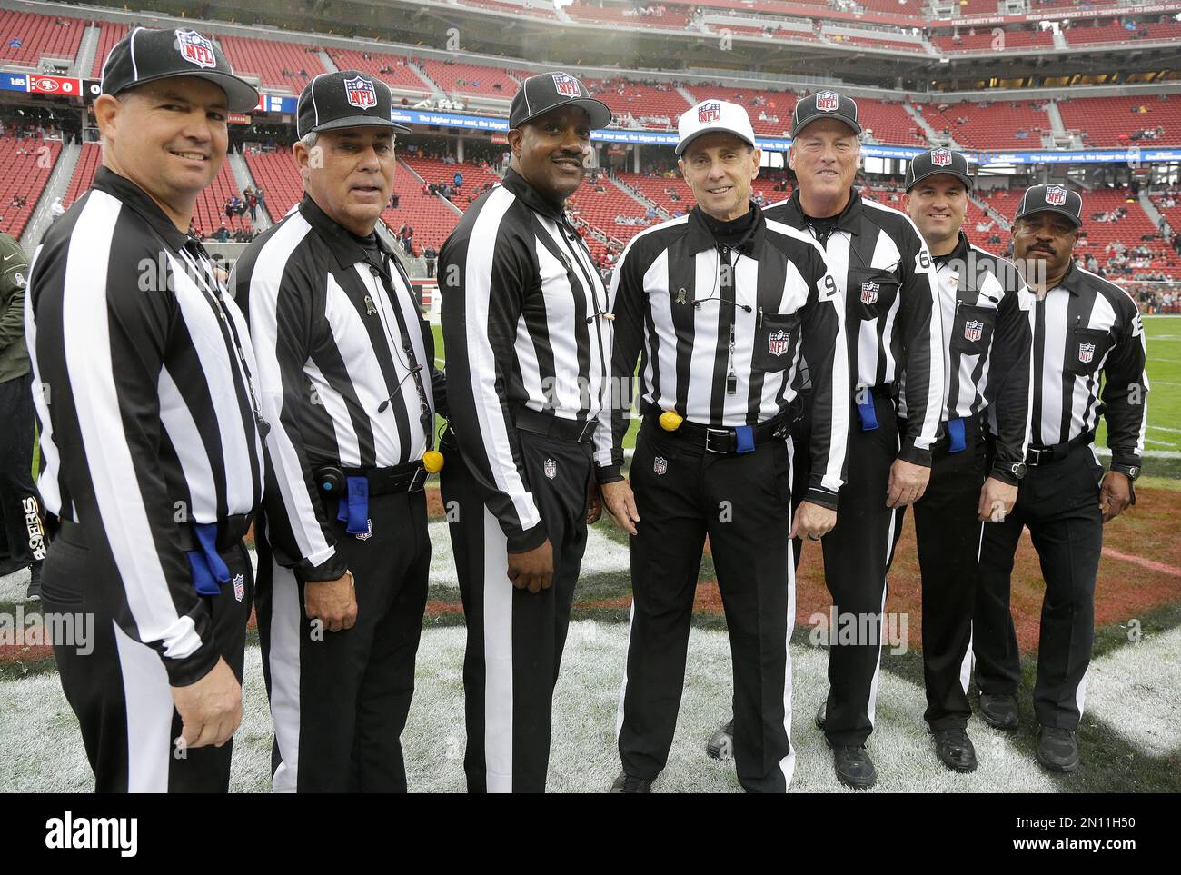 NFL officials back judge Greg Wilson (119), from left, head linesman ...