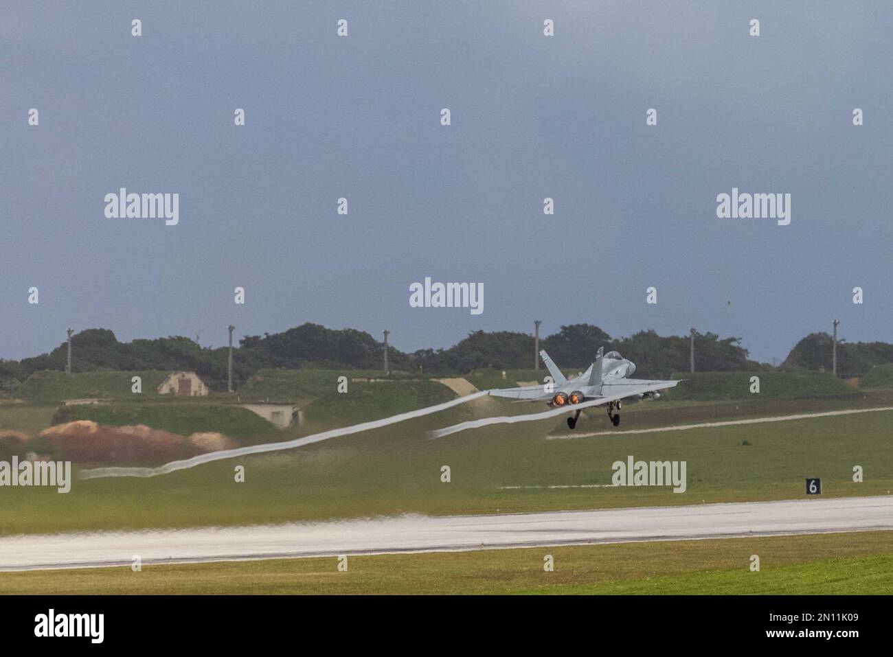 A U.S. Marine Corps F/A-18C Hornet aircraft with Marine Fighter Attack ...