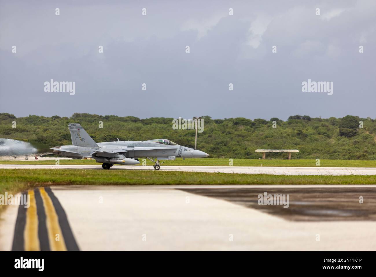 A U.S. Marine Corps F/A-18C Hornet aircraft with Marine Fighter Attack ...