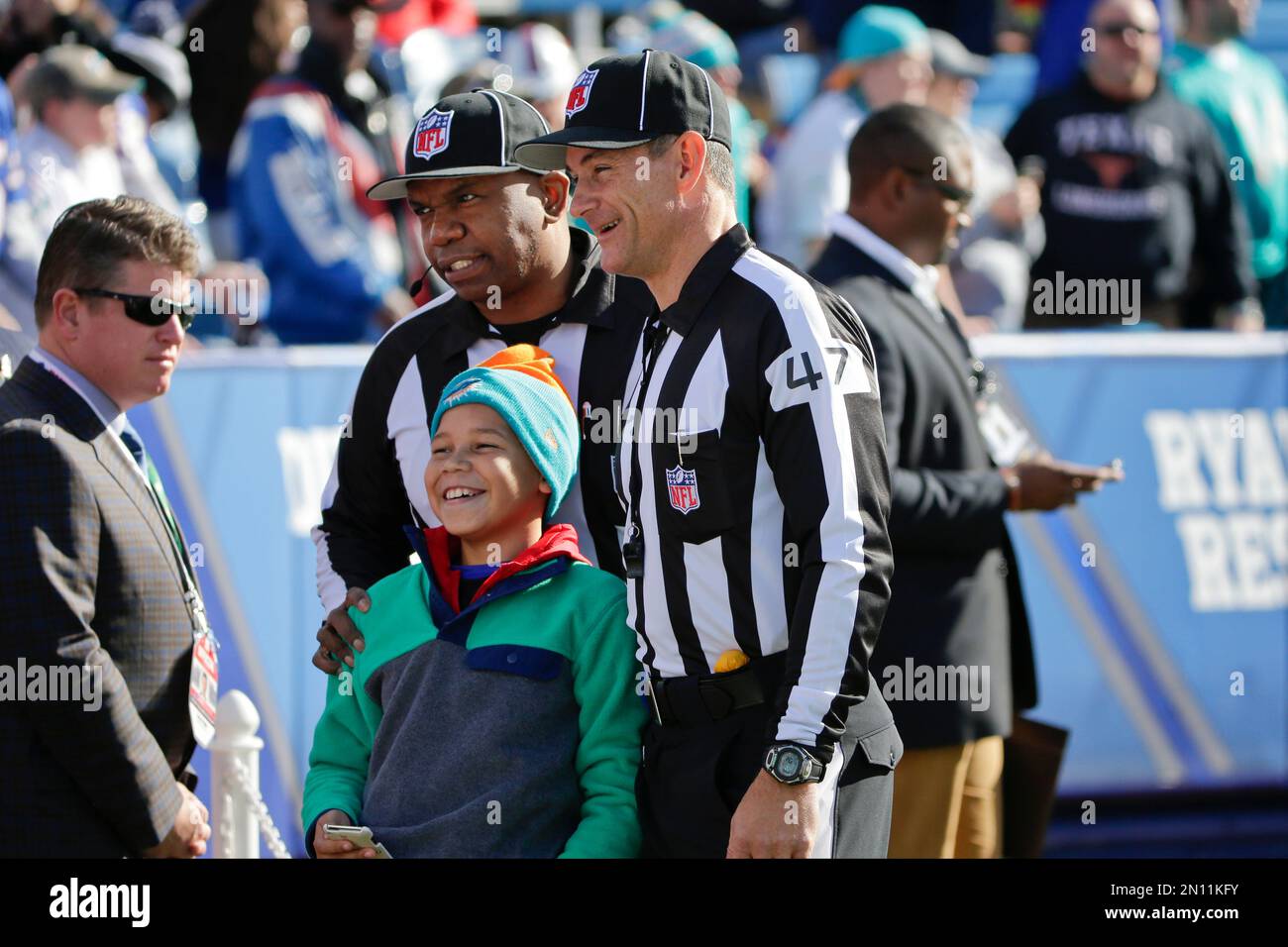 Umpire Undrey Wash (96) and line judge Tim Podraza (47) pose for ...