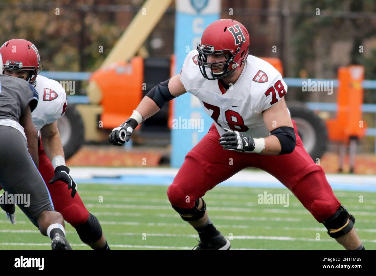 Harvard Crimson's Cole Toner #78 in action against the Columbia Lions ...