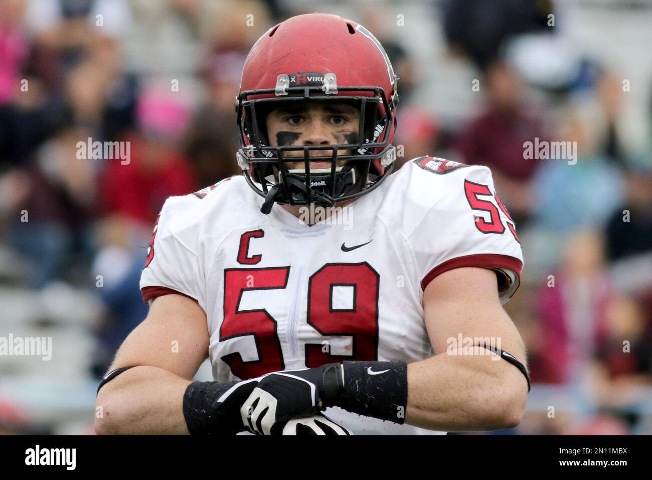 Harvard Crimson's Matt Koran #59 in action against the Columbia Lions ...
