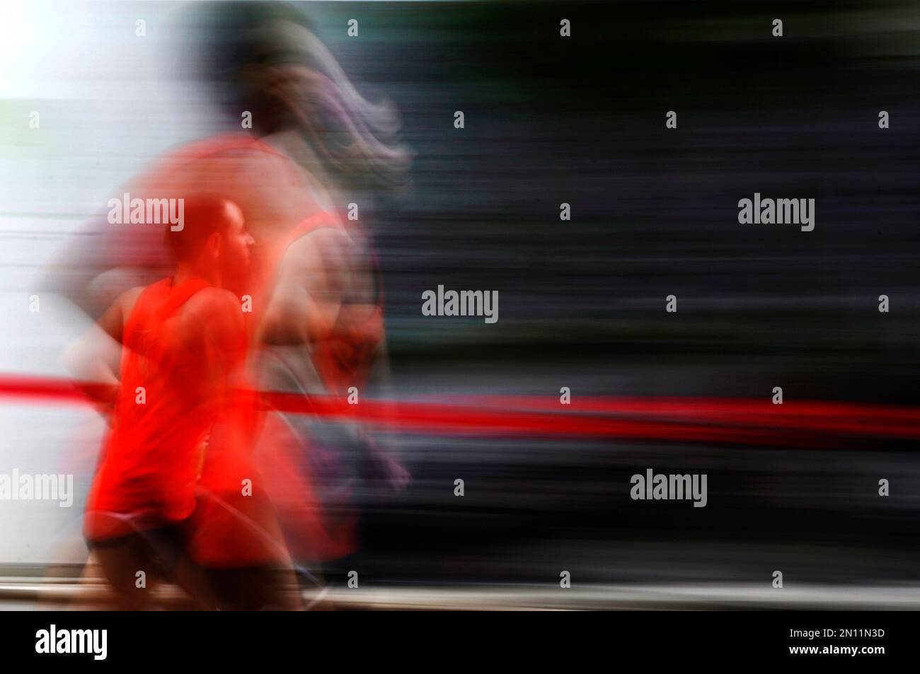 A runner competes in the 42 kilometer (26 mile) Beirut Marathon in ...