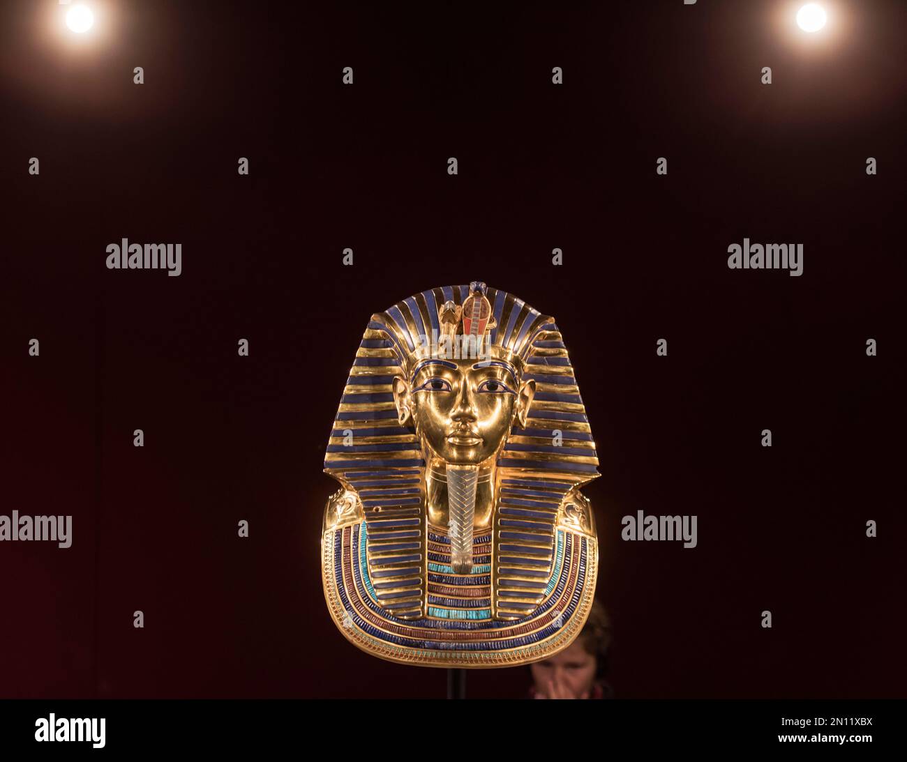 A replica of Tutankhamun's mask is on display in the exhibition ...