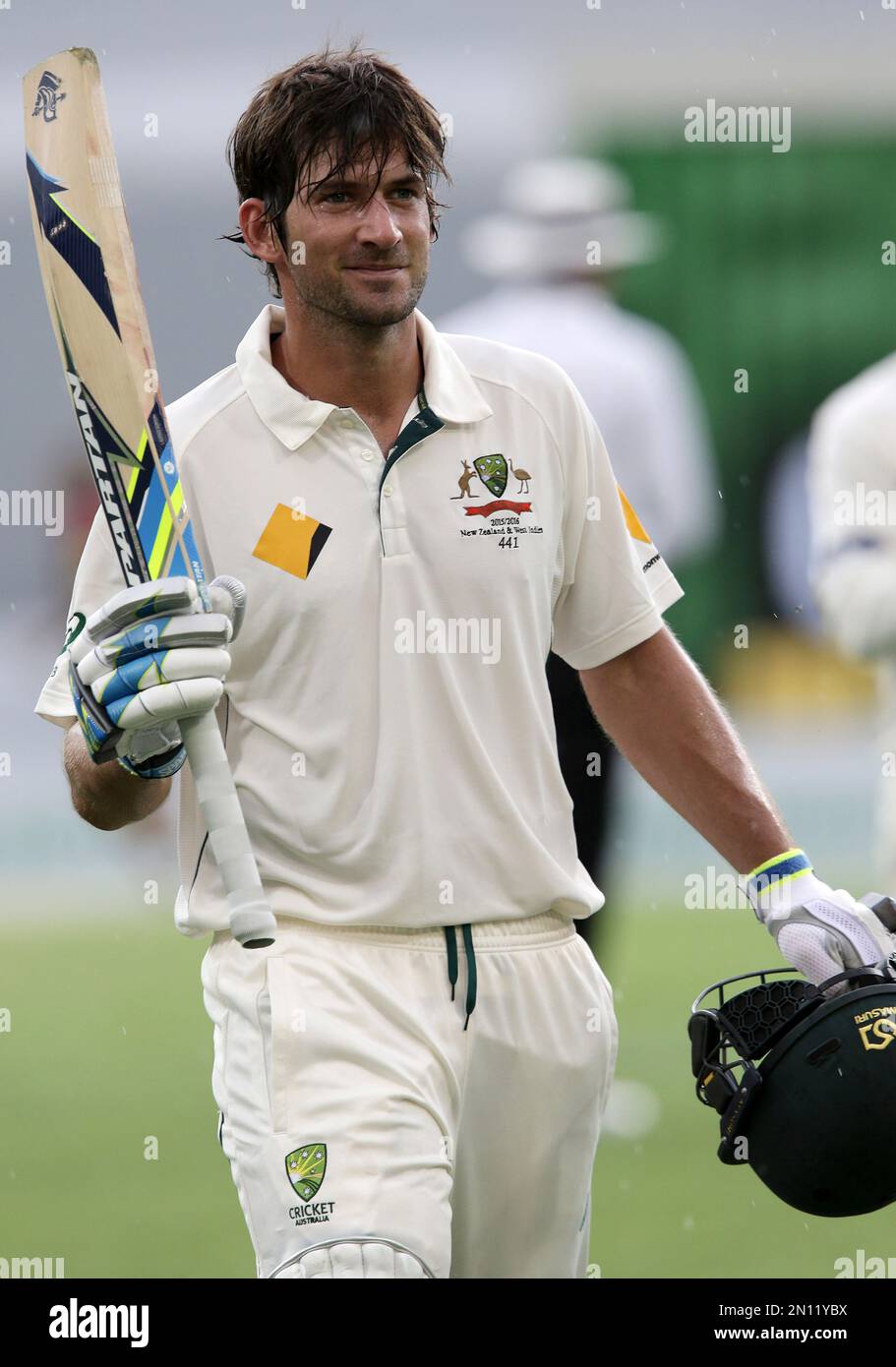 Australia's Joe Burns celebrates after he reached 100 runs during play ...