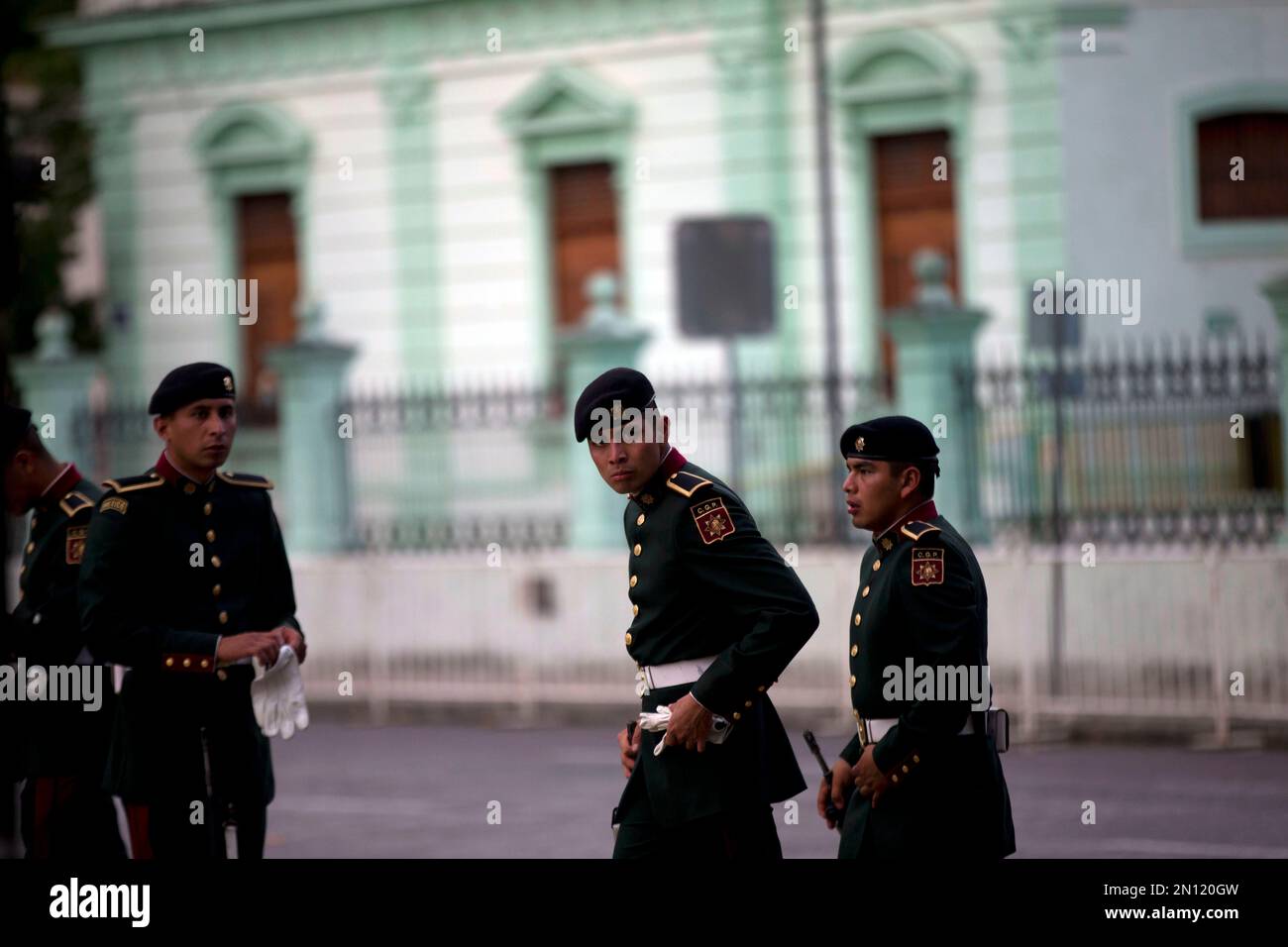Members of a Mexican honor guard stand in Plaza de la Mejorada, as they ...
