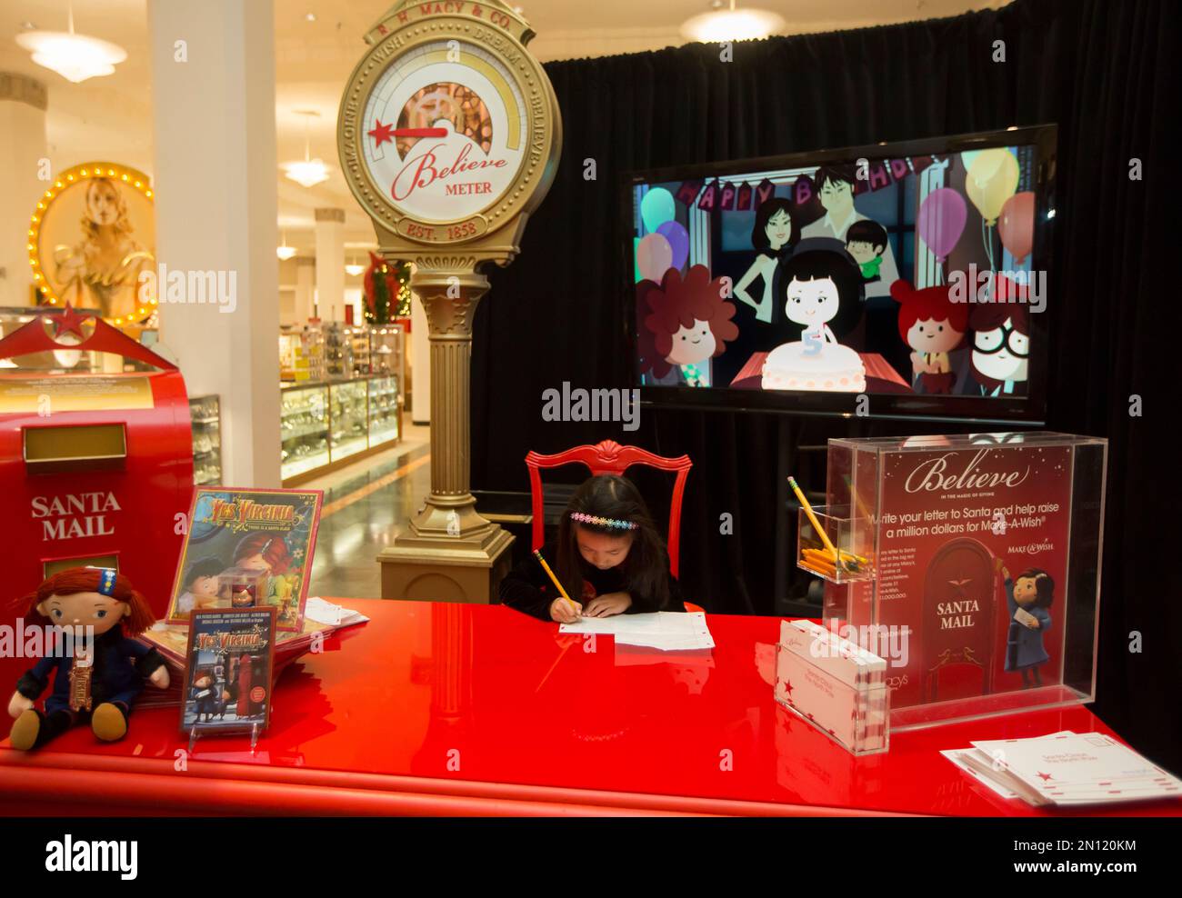 Alexis Hwa writes the ceremonial first letter to Santa to launch the ...