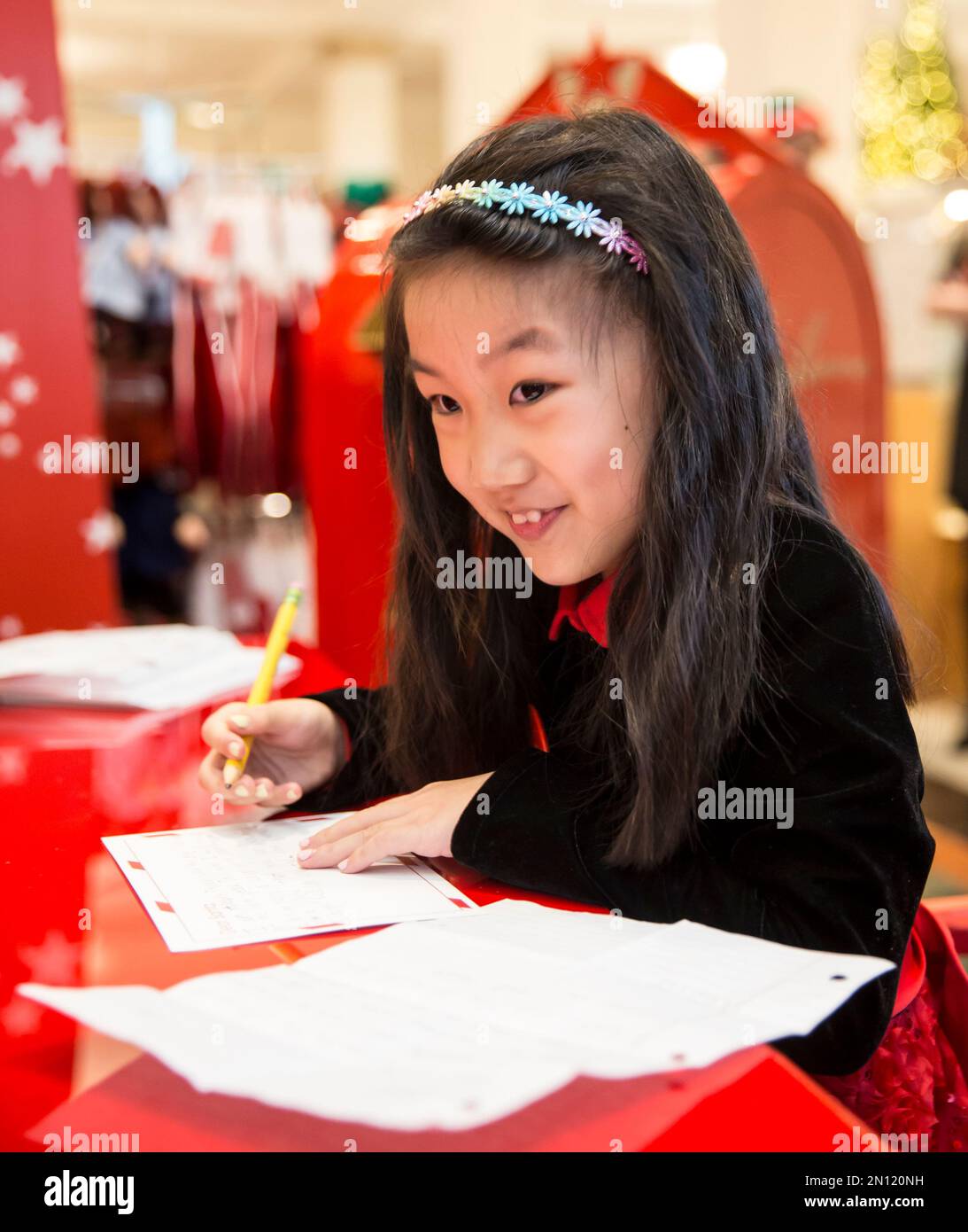 Alexis Hwa writes the ceremonial first letter to Santa to launch the ...