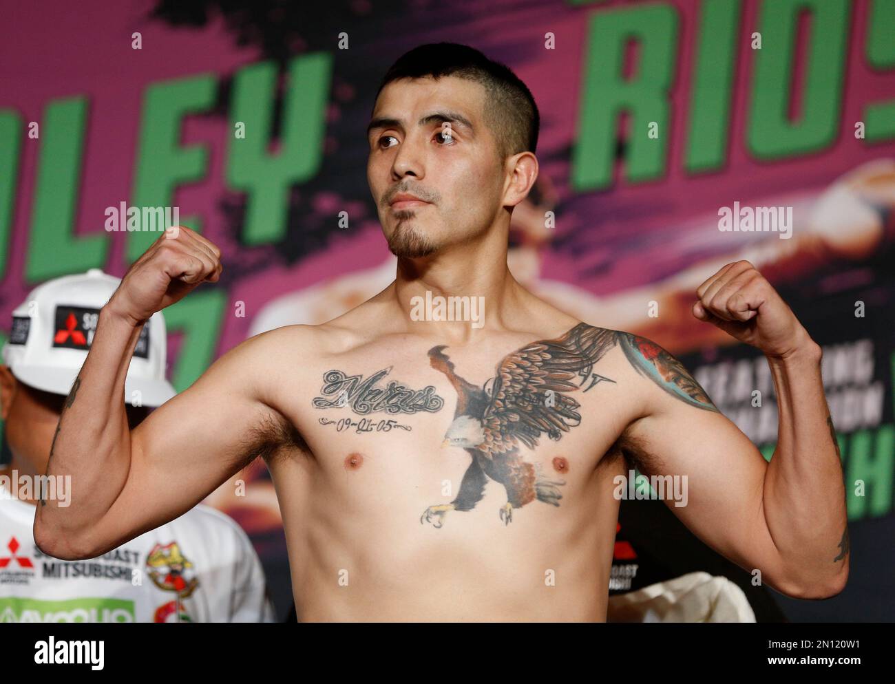 Brandon Rios poses on the scale during a weigh-in Friday, Nov. 6, 2015 ...