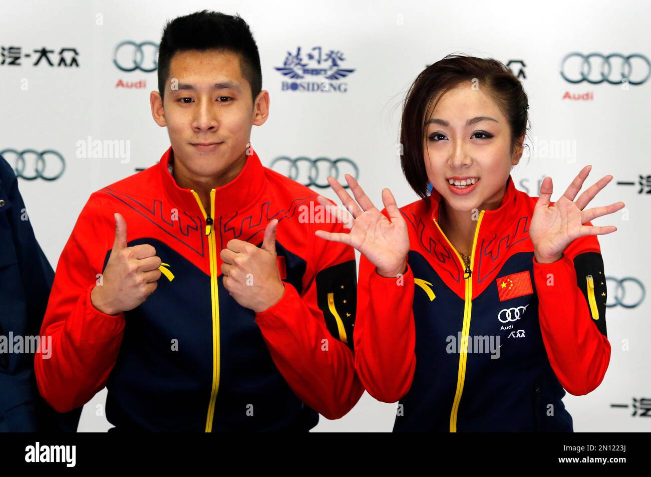 China's Sui Wenjing and Han Cong gesture after competing in the Pairs ...