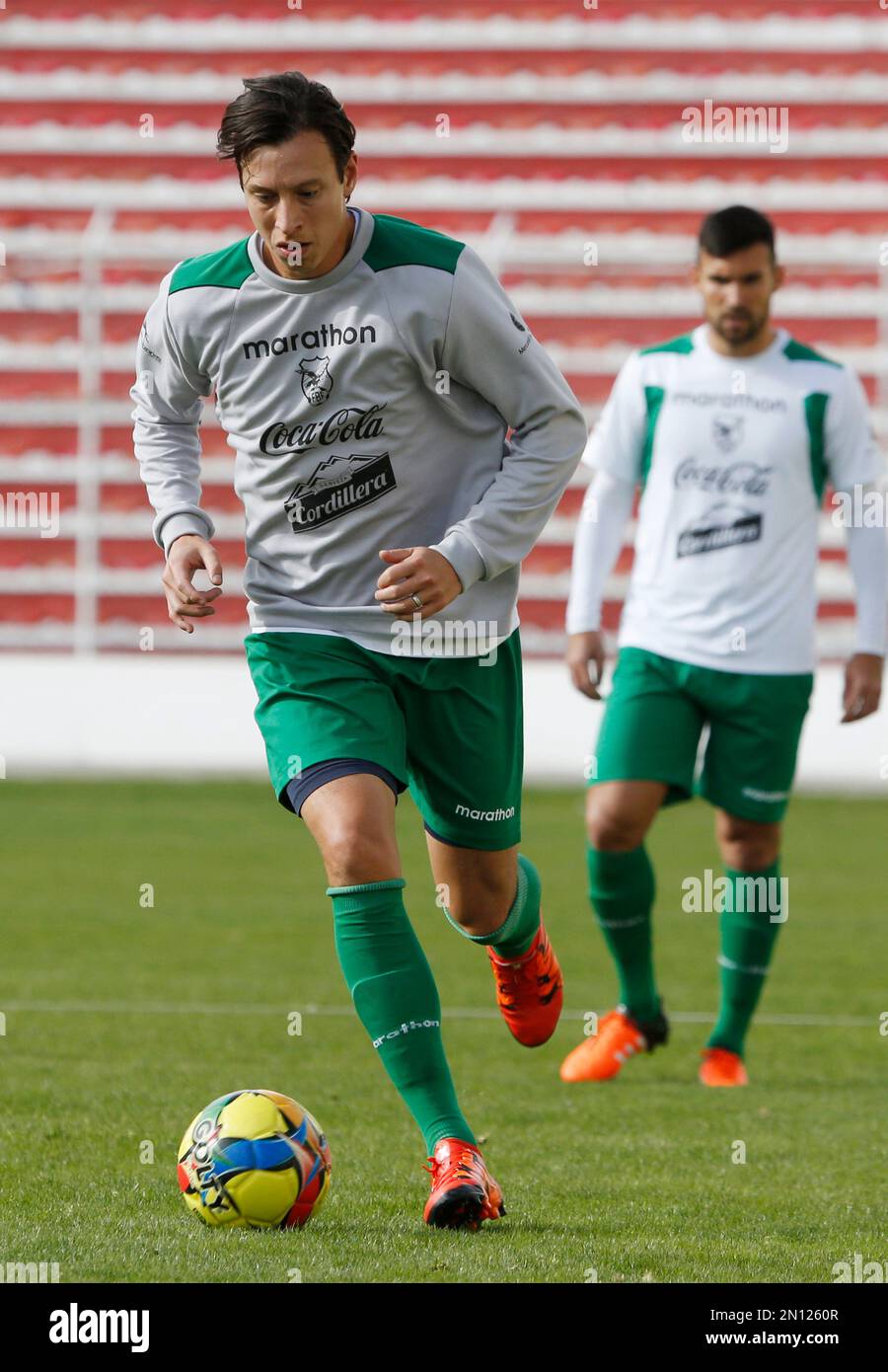 Bolivia's Martin Smedberg, front, controls the ball during a practice ...