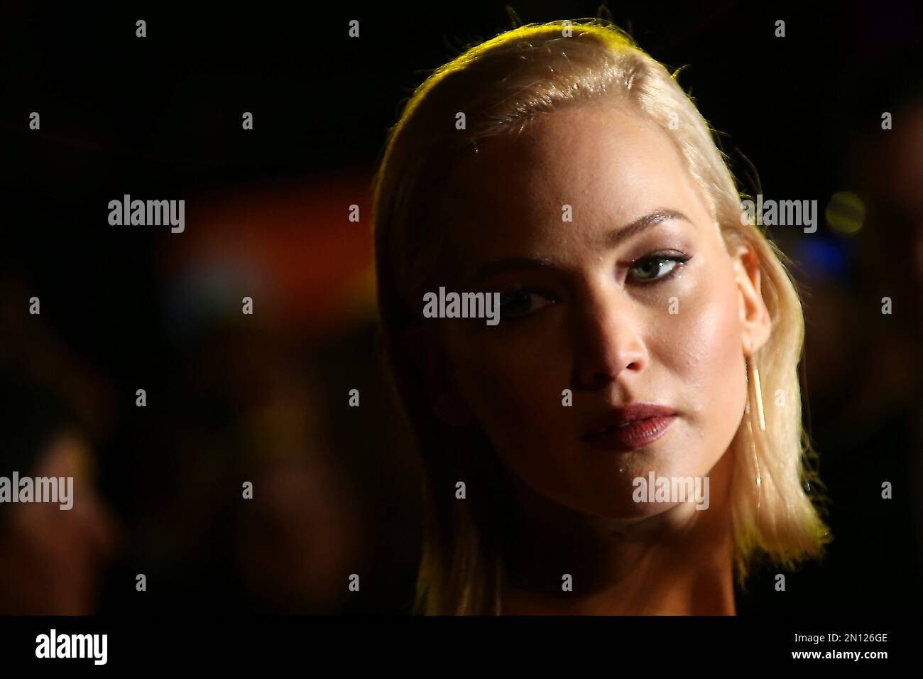 Jennifer Lawrence poses for photographers upon arrival at the premiere ...