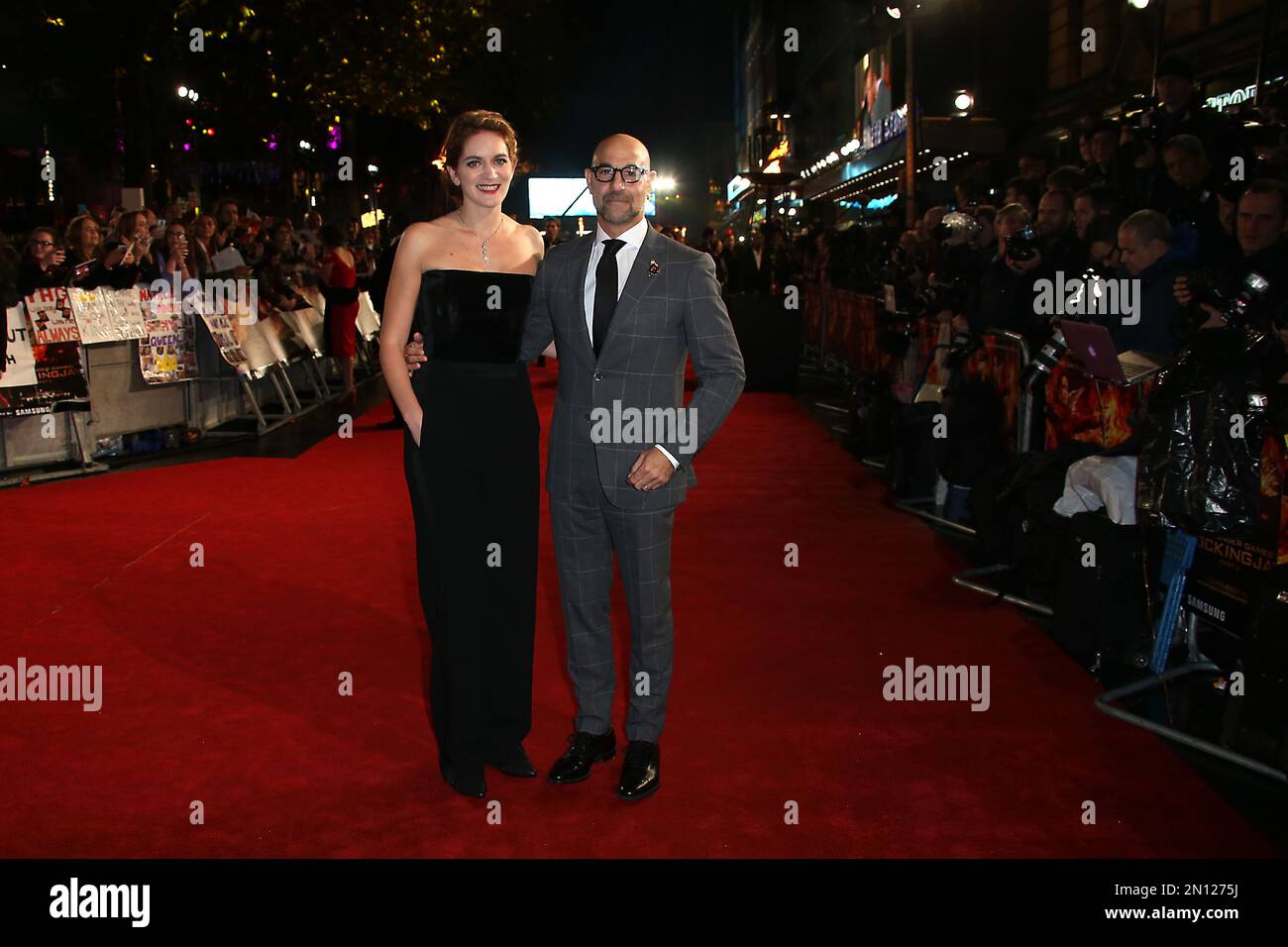 Stanley Tucci, right, and Felicity Blunt pose for photographers upon ...