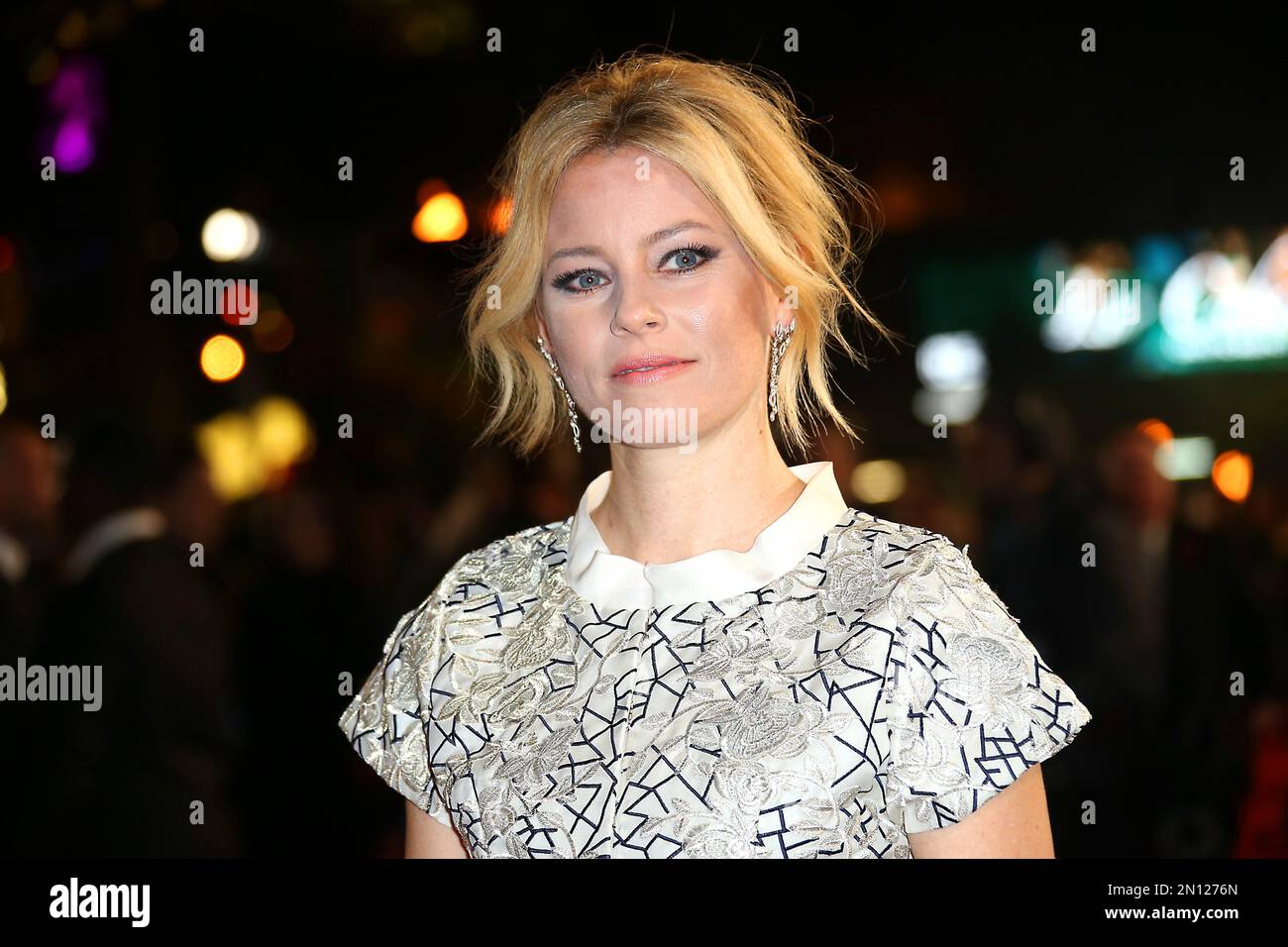 Elizabeth Banks poses for photographers upon arrival at the premiere of ...