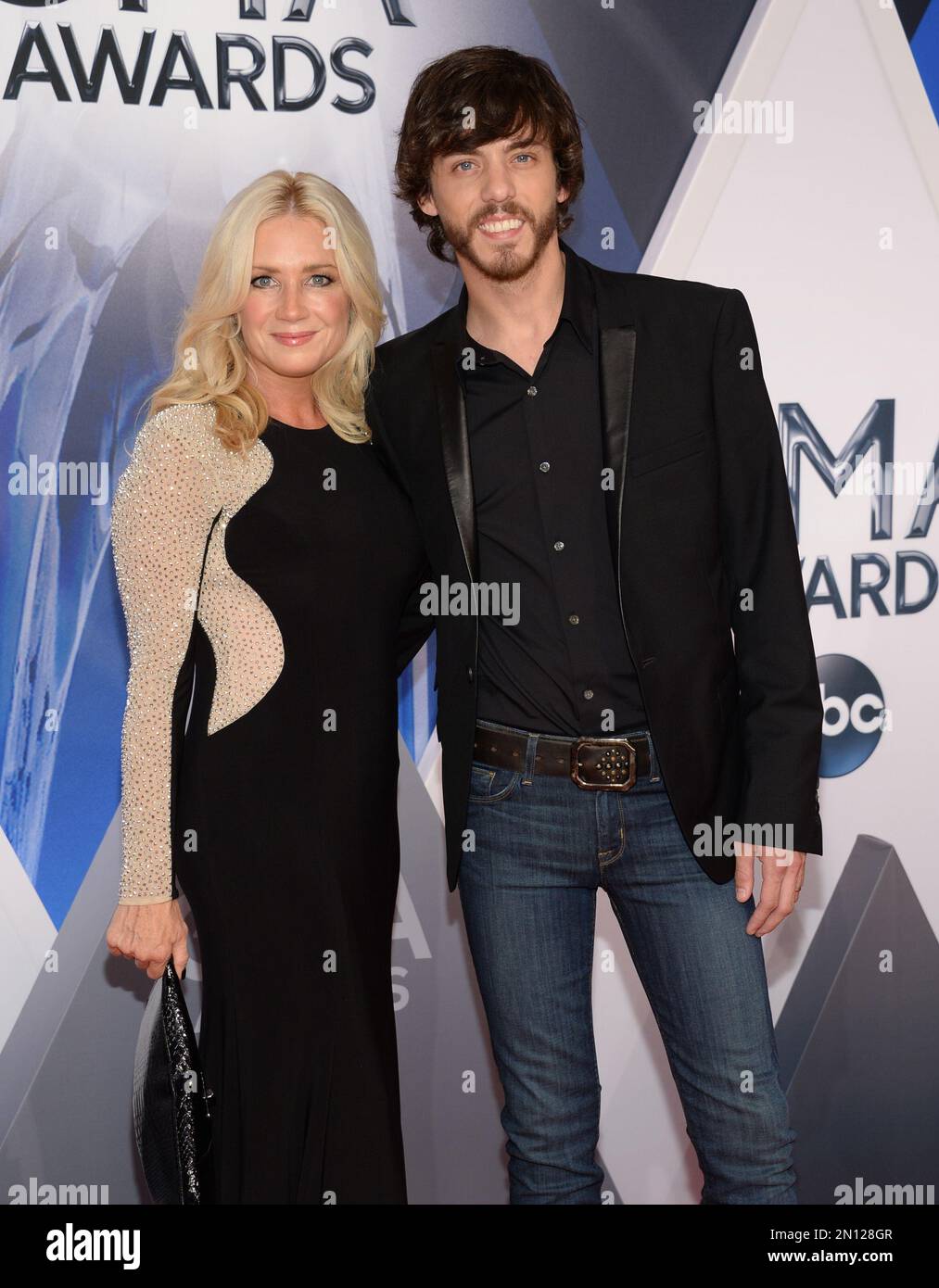 Kelly Lynn Janson, left, and Chris Janson arrive at the 49th annual CMA ...