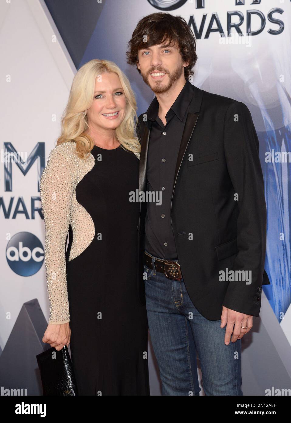 Kelly Lynn Janson, left, and Chris Janson arrive at the 49th annual CMA ...