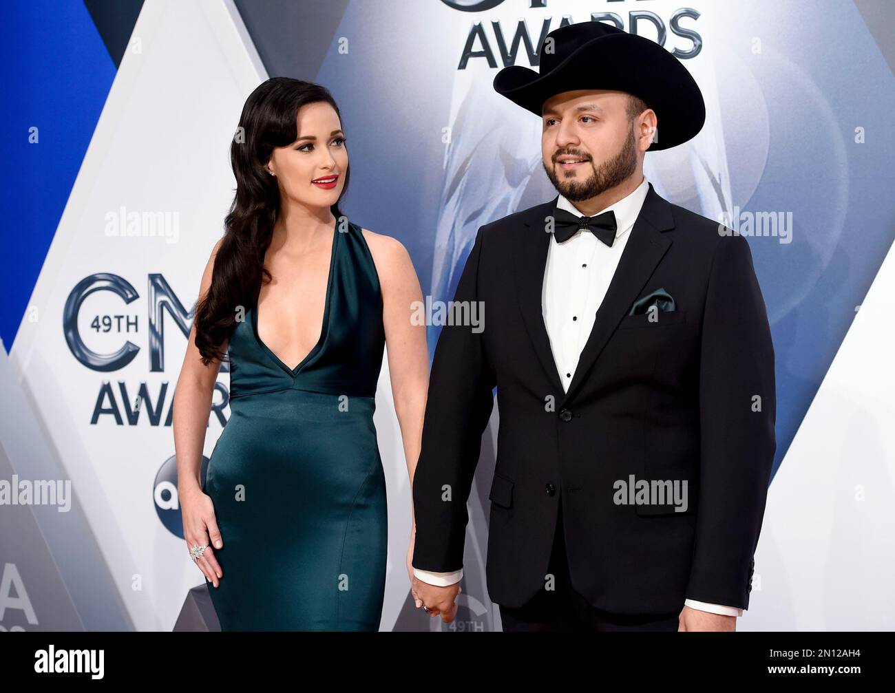 Kacey Musgraves Left And Misa Arriaga Arrive At The 49th Annual Cma