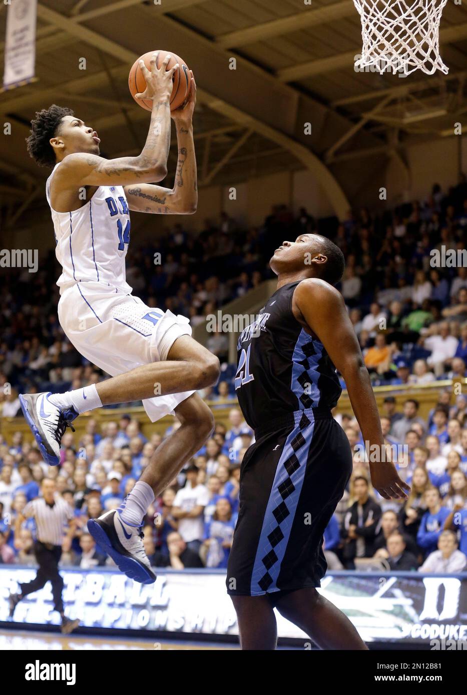 Duke's Brandon Ingram (14) drives to the basket as Livingstone's Mark ...