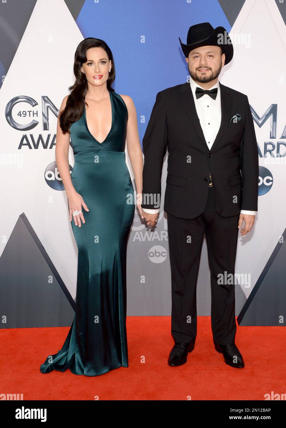 Kacey Musgraves Left And Misa Arriaga Arrive At The 49th Annual Cma