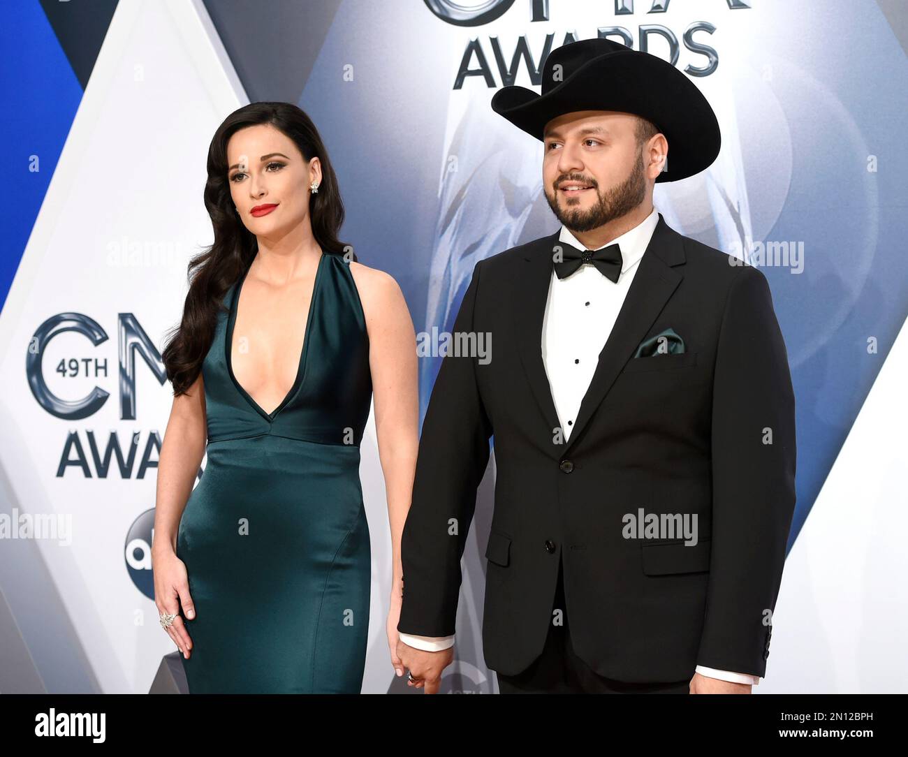 Kacey Musgraves Left And Misa Arriaga Arrive At The 49th Annual Cma