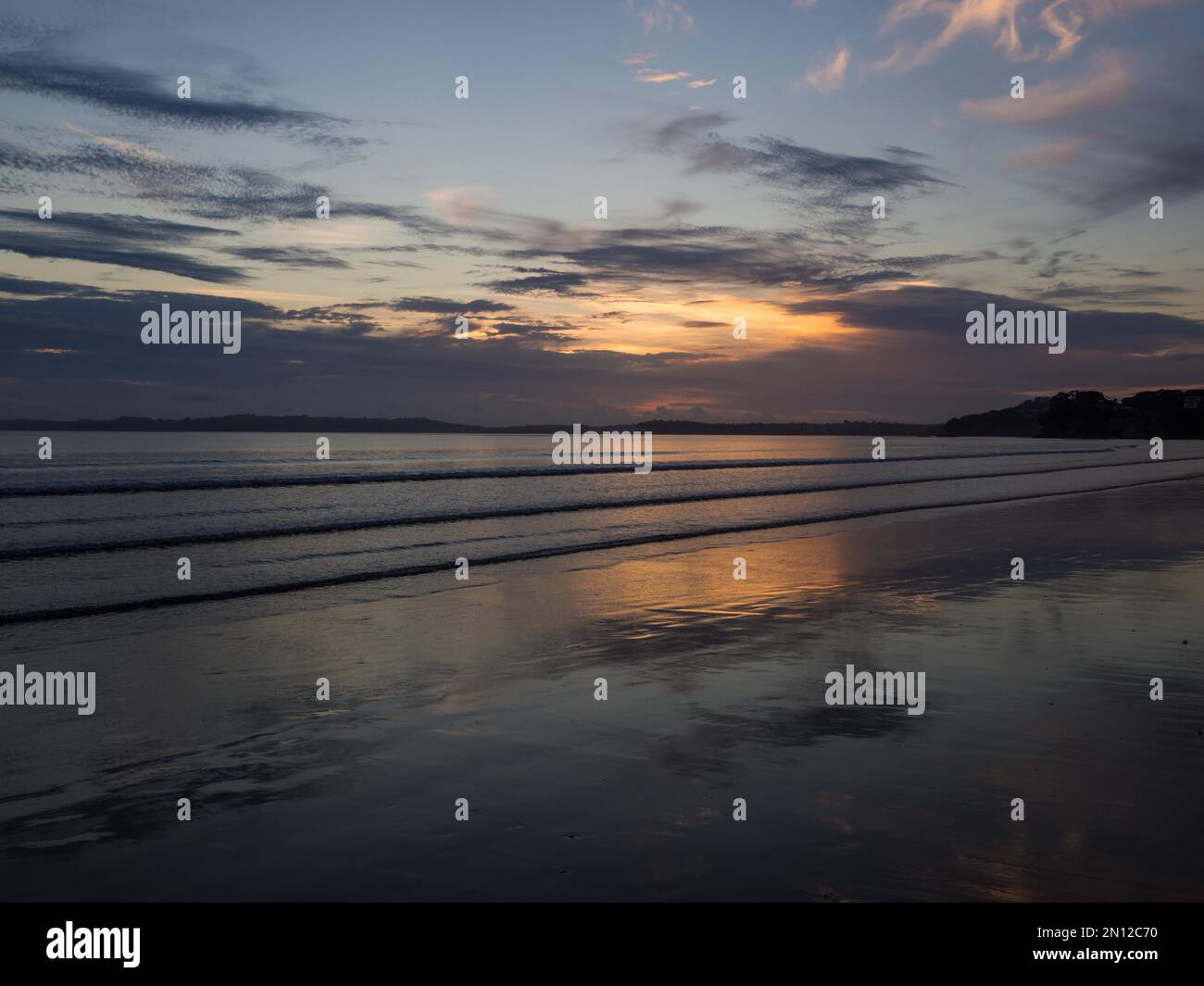 Morning atmosphere in front of sunrise at Orewa beach, Orewa, Auckland ...
