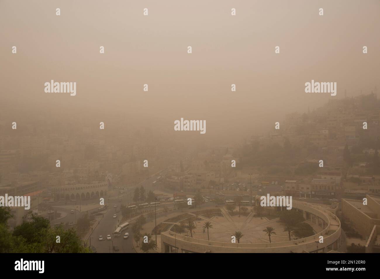 A sandstorm engulfs downtown Amman, Jordan, Wednesday, Nov. 4, 2015. A ...