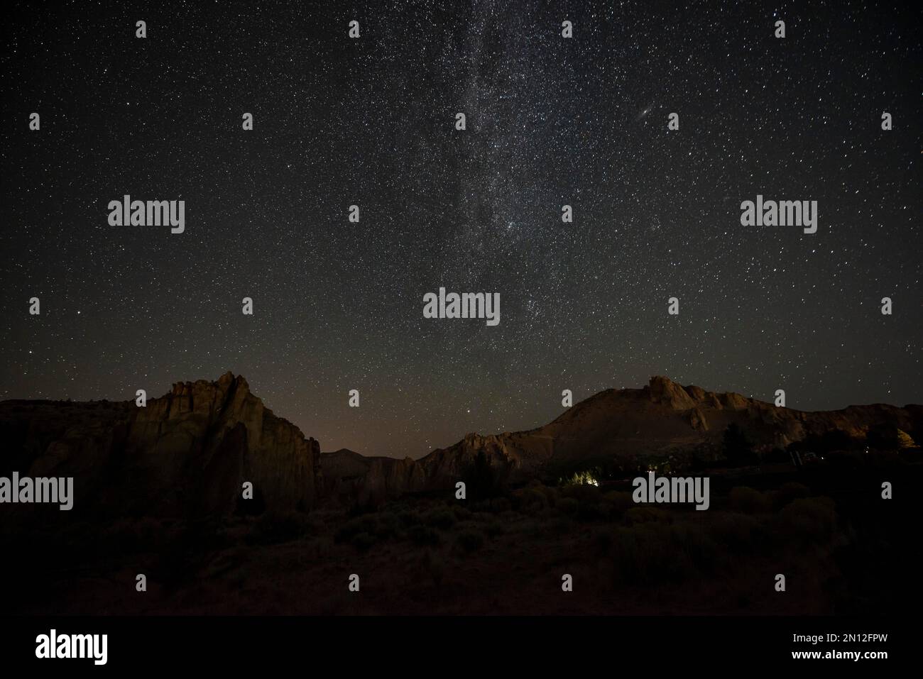 Canyon in front of night sky, starry sky with Milky Way, Smith Rock ...