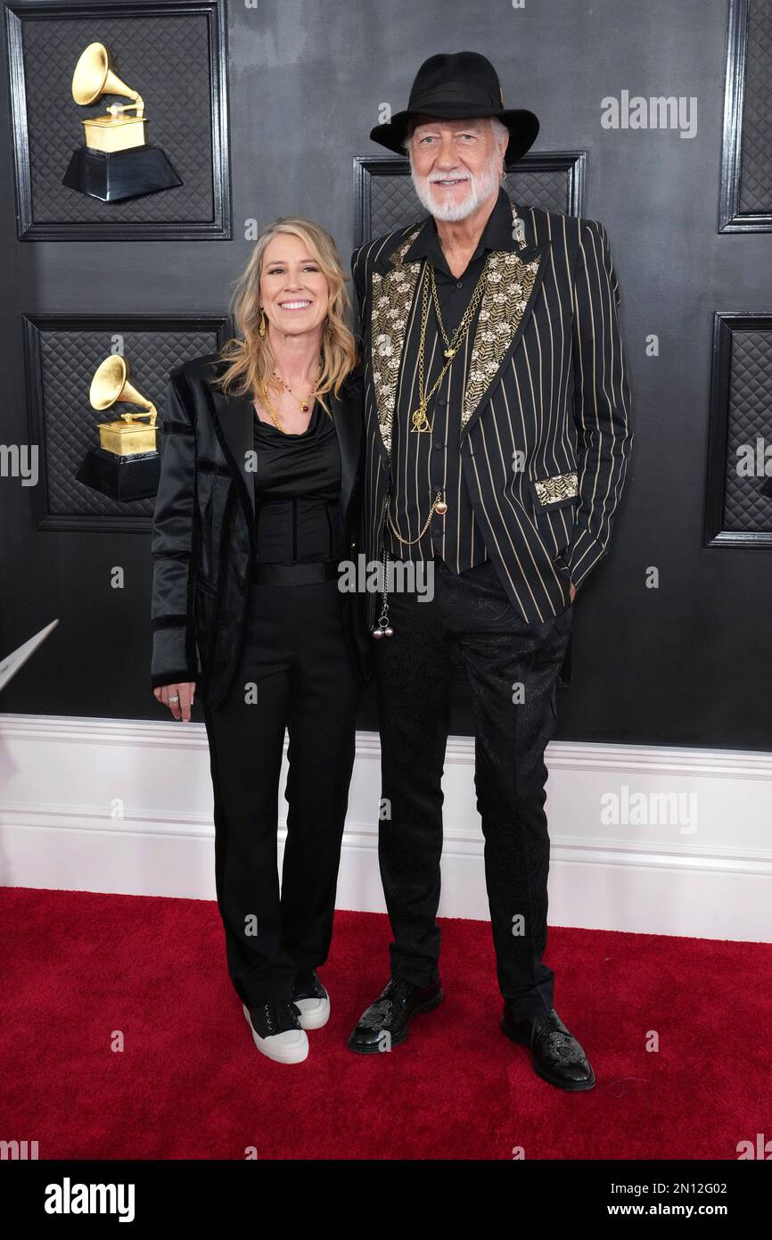 Elizabeth Jordan, left, and Mick Fleetwood arrive at the 65th annual ...