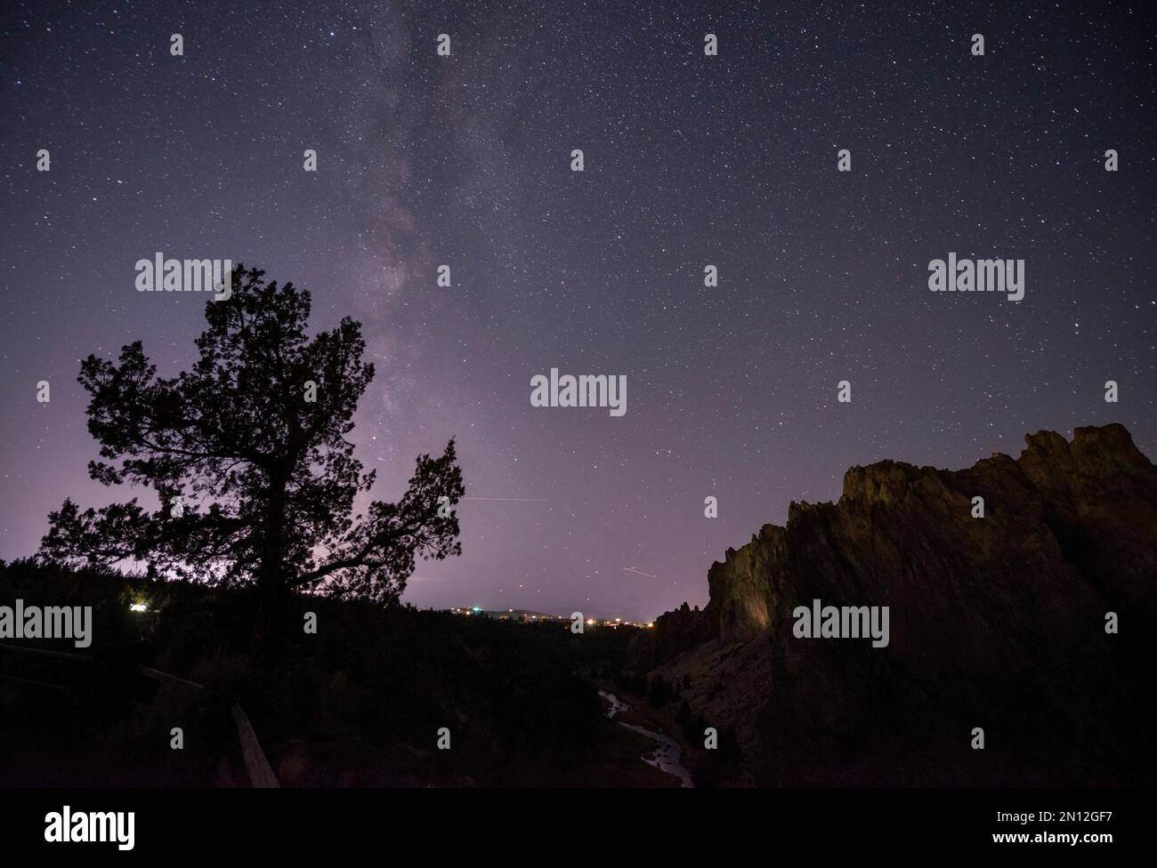 Night sky, starry sky with Milky Way, tree and canyon, Smith Rock State ...