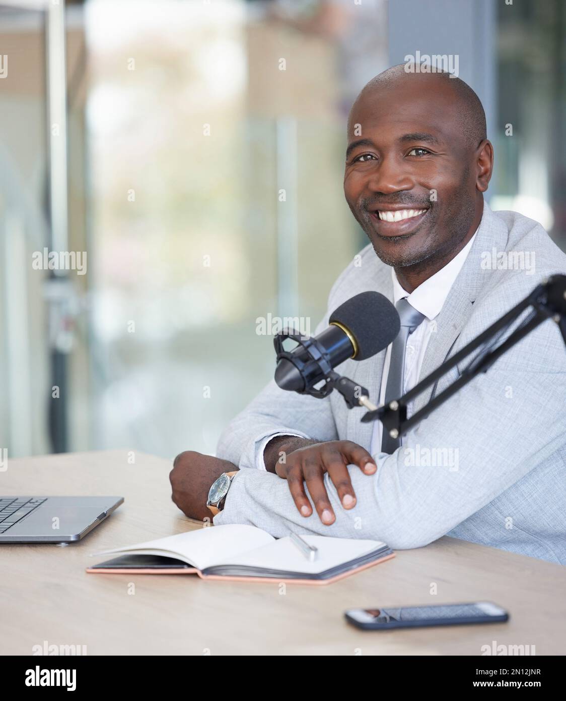 Broadcast, portrait and black man with microphone, radio podcast or ...