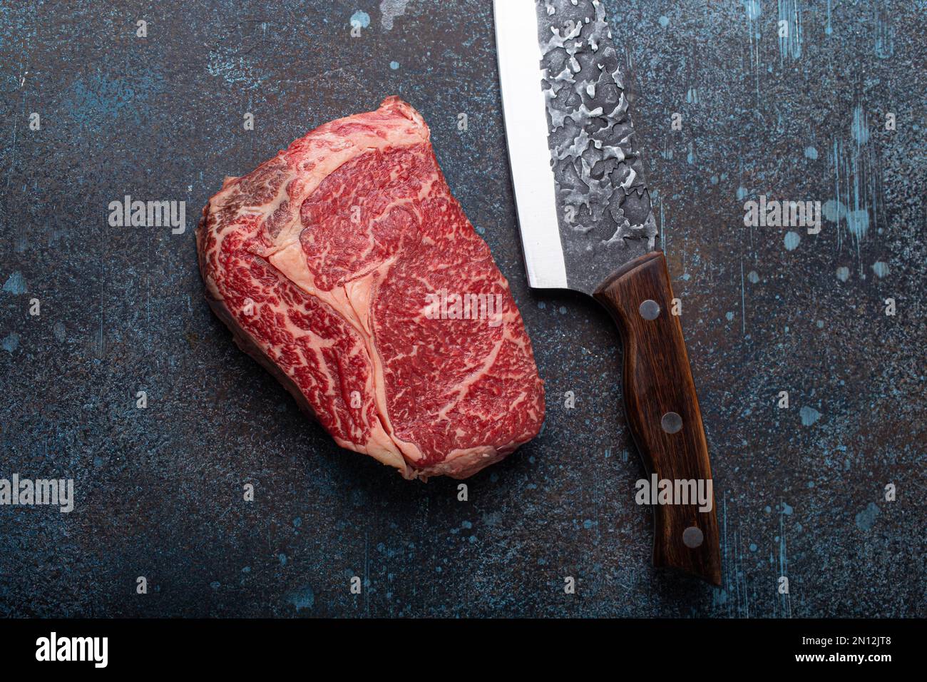 Raw fresh uncooked meat beef prime cut steak Ribeye on clean red ...
