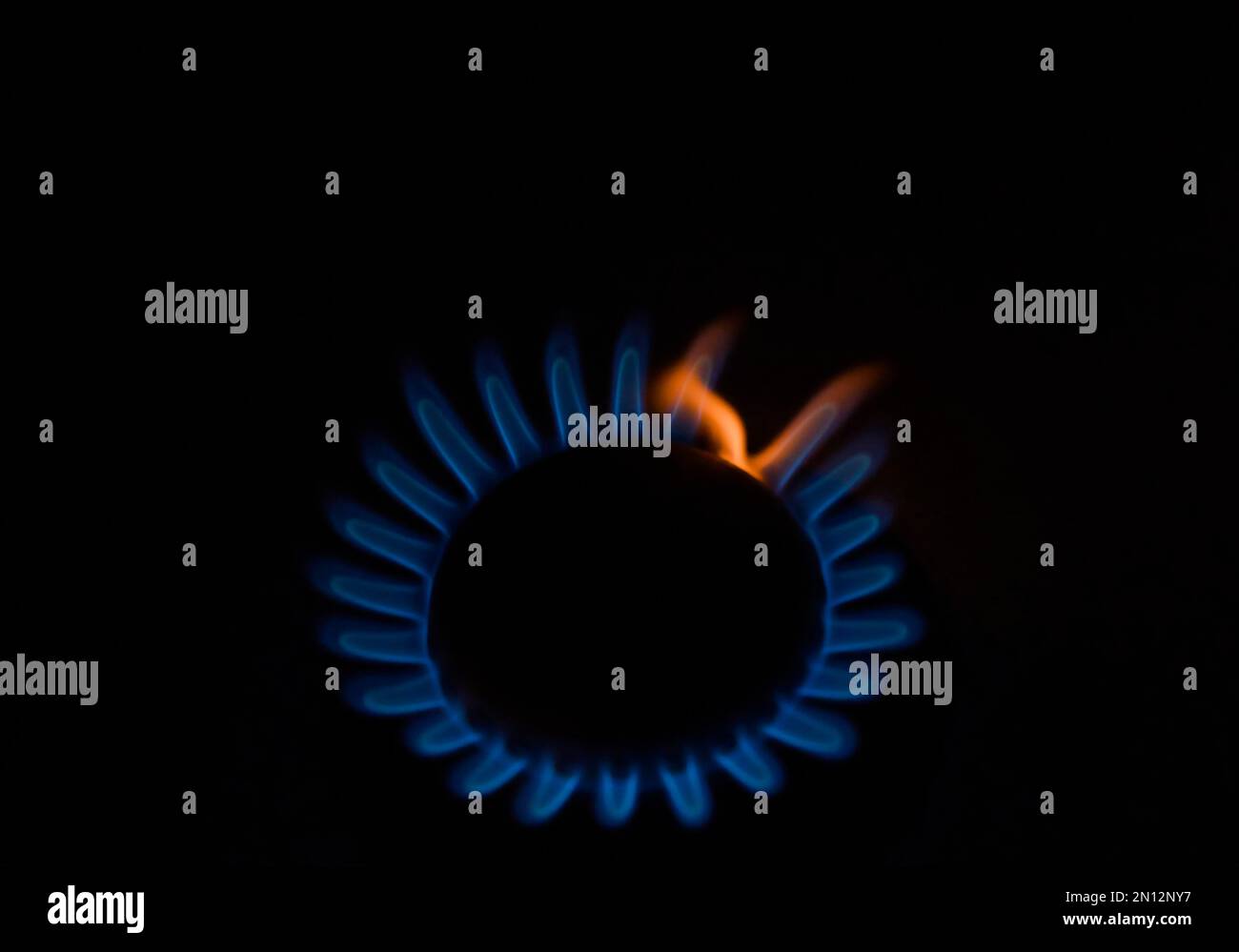 Blue gas flame on a gas stove, close up Stock Photo - Alamy