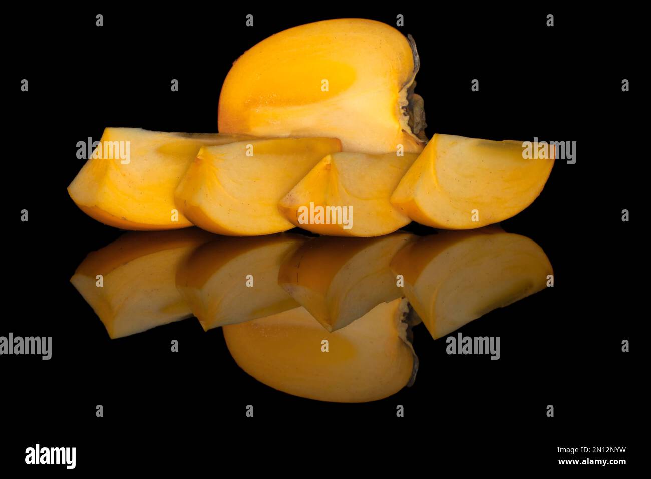 Persimmon, the fruit of the japanese persimmon (Diospyros kaki), studio ...