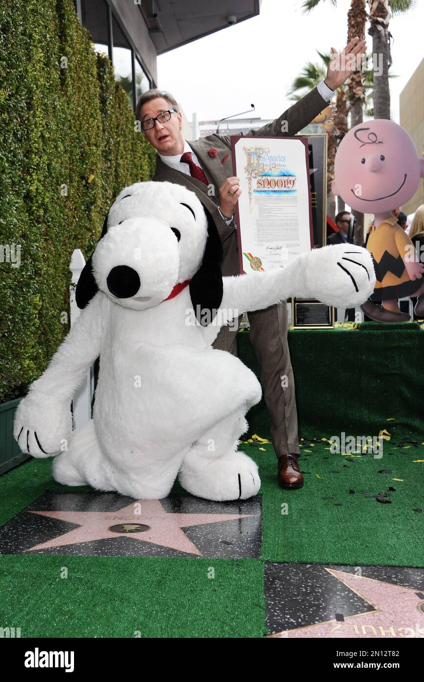 Snoopy and producer Paul Feig attend a ceremony honoring Snoopy with a ...