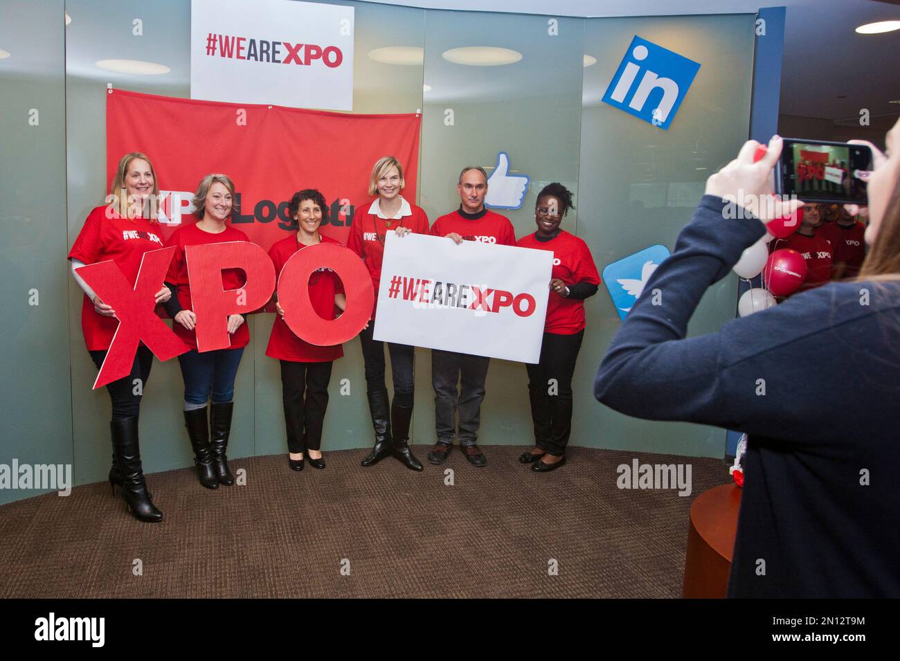 XPO Logistics employees take photos for social media during launch day ...
