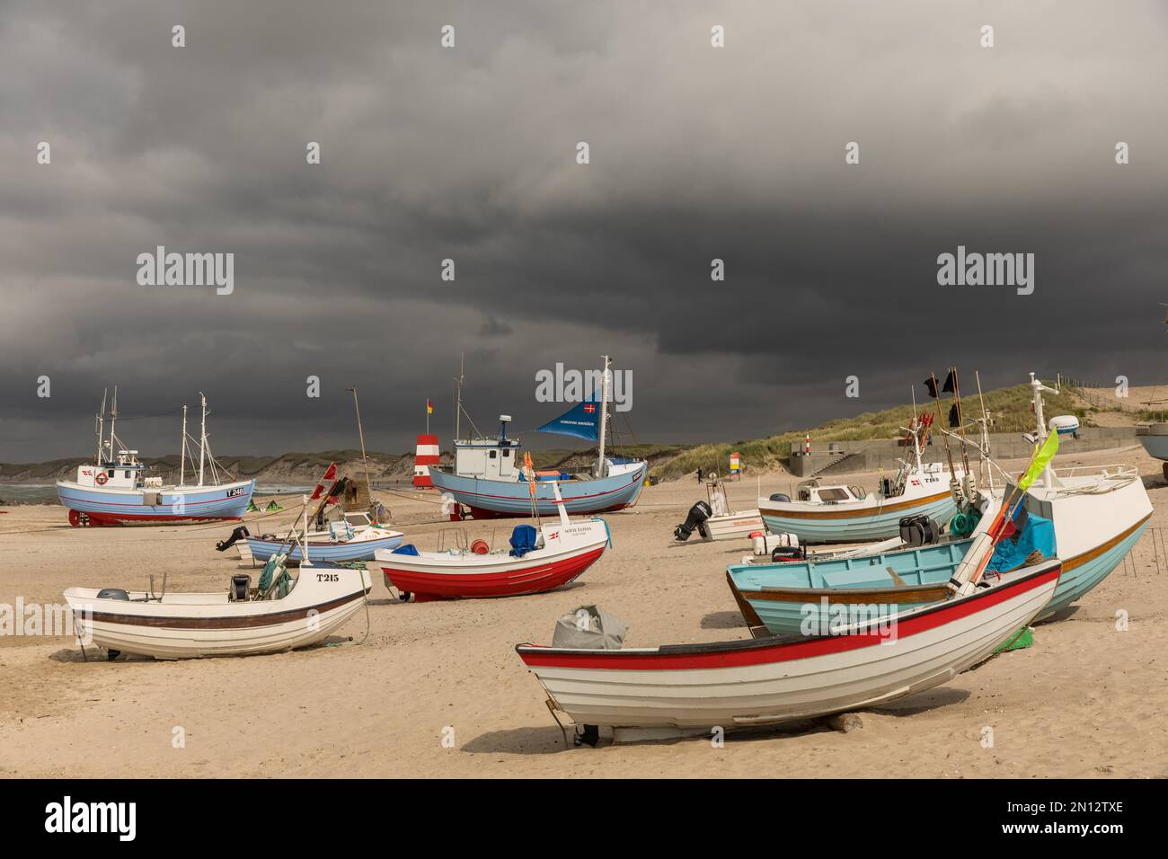 Dark sky over the harbour of Vorupör, Region Thy, Jutland, Denmark ...