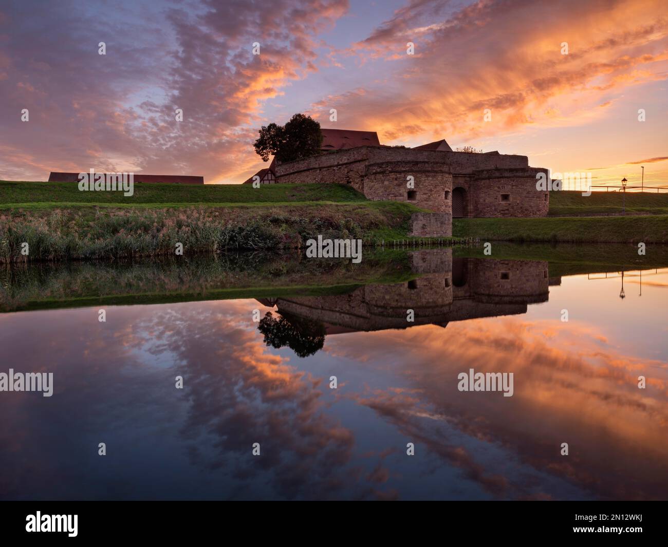 Heldrungen moated castle and fortress at sunset, gate building with ...