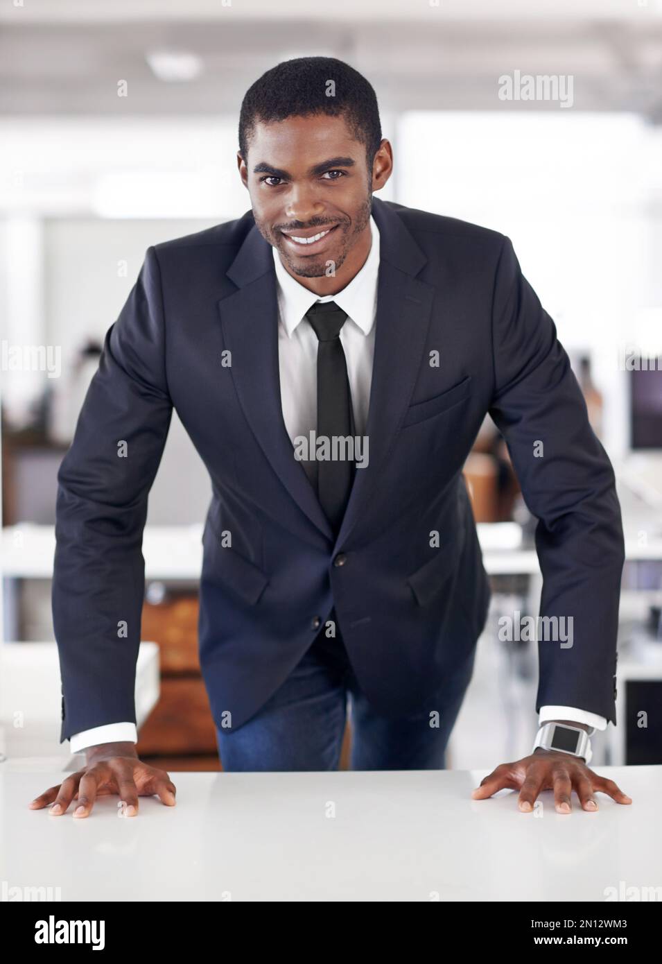 Professional man standing desk hi-res stock photography and images - Alamy