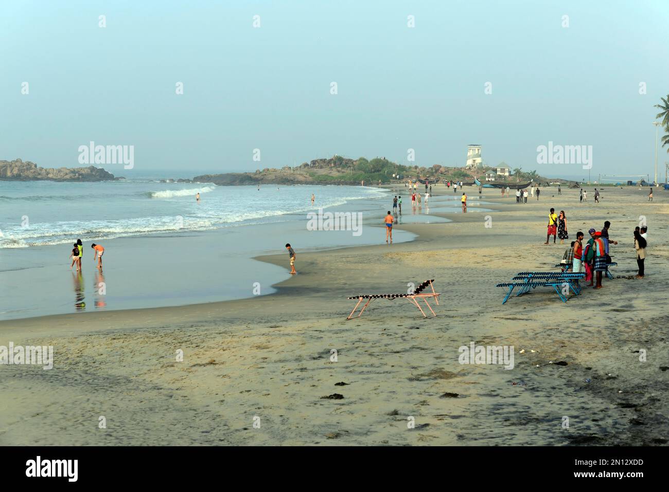 Holidaymakers on the beach of Kovalam, Malabar Coast, Malabar, Kerala ...