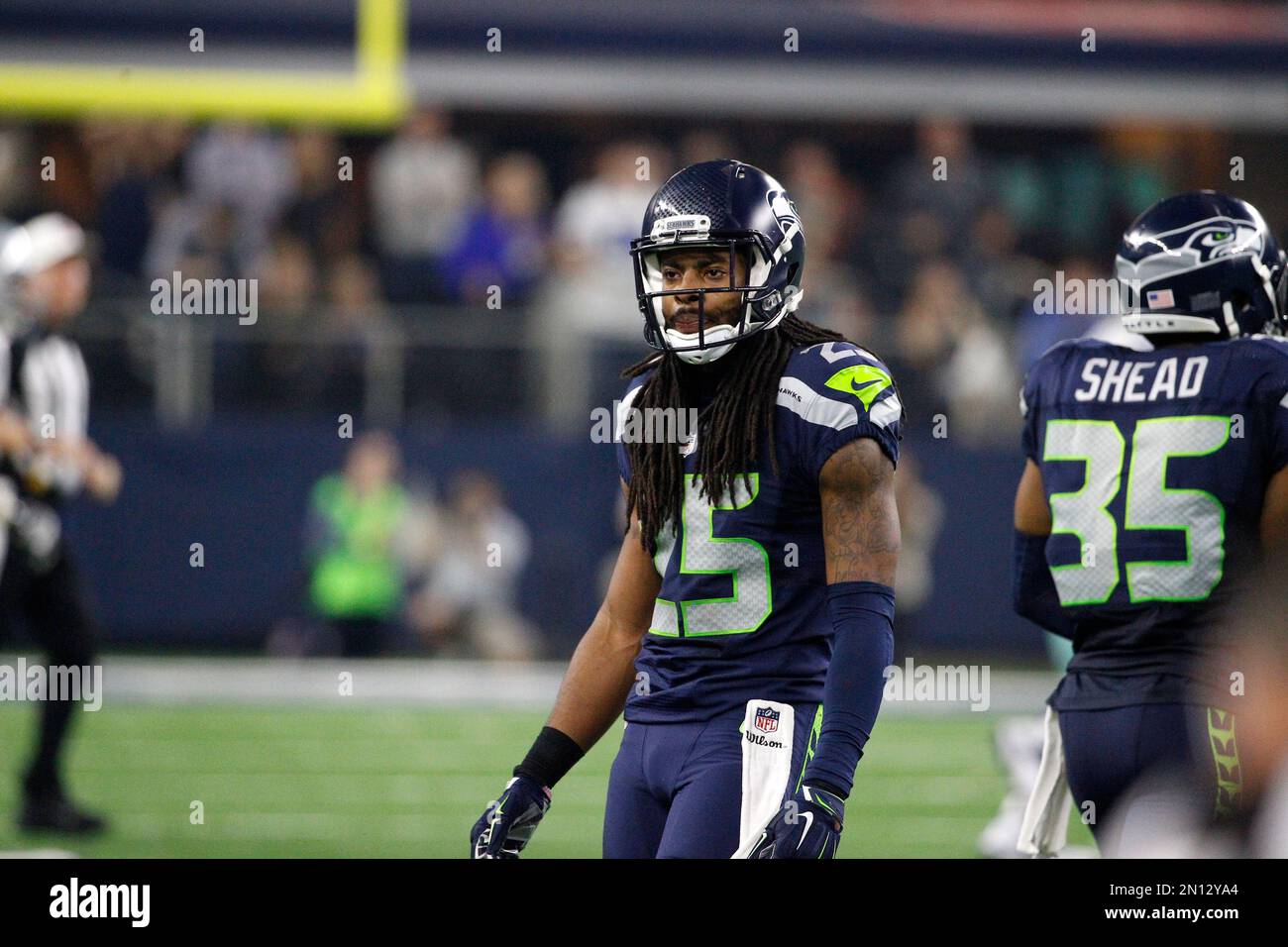 Seattle Seahawks' Richard Sherman (25) walks along the sideline during ...