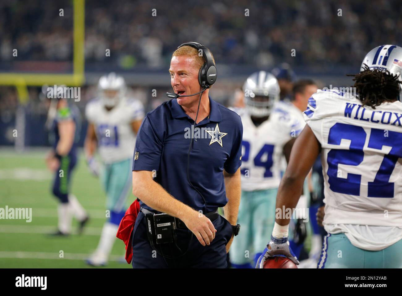 Dallas Cowboys head coach Jason Garrett smiles after J.J. Wilcox (27 ...