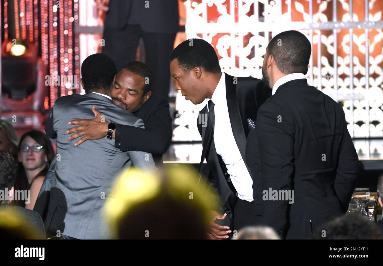 F. Gary Gray, third from right, congratulates from left, Jason Mitchell ...