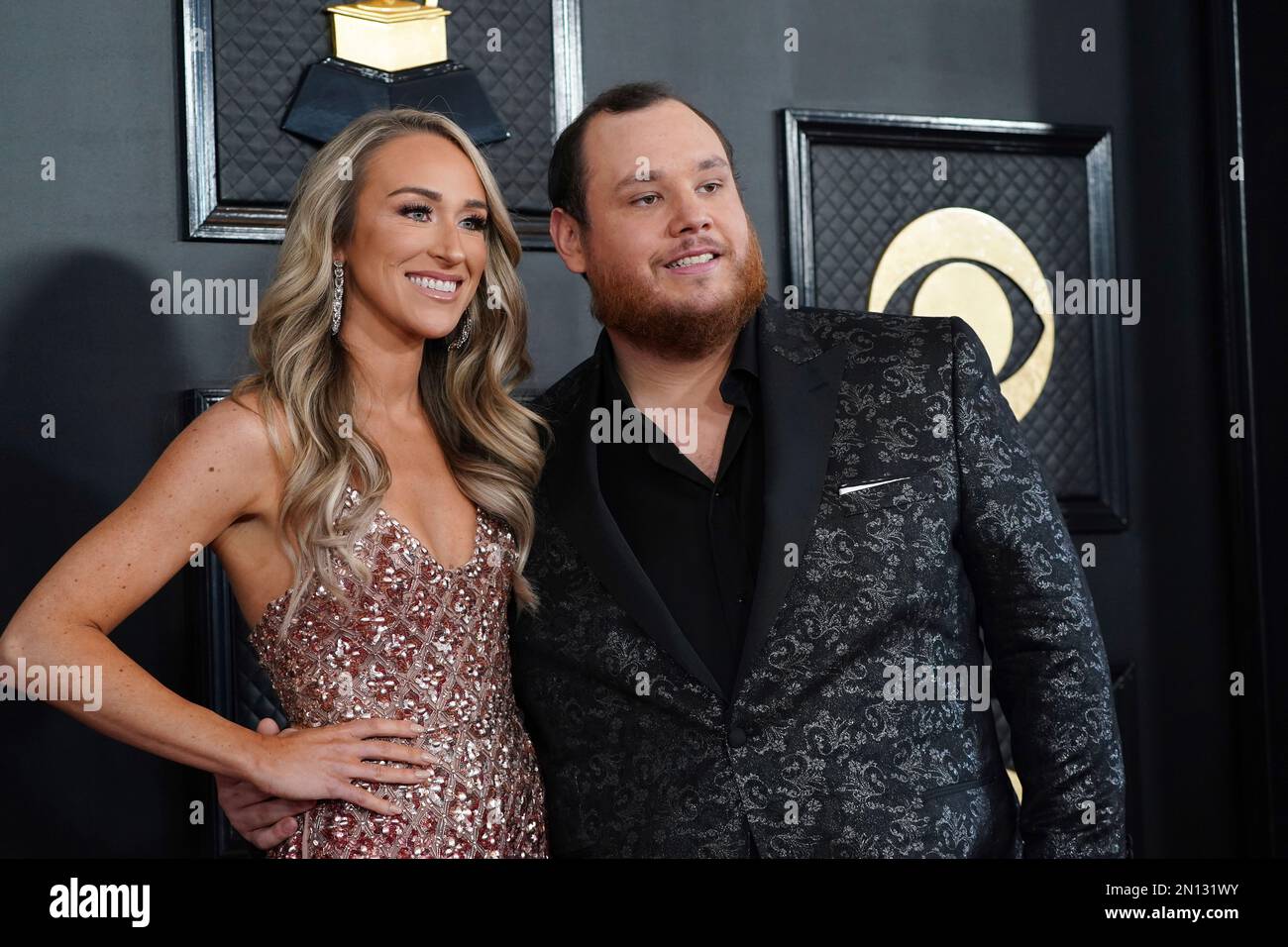 Luke Combs, right, and Nicole Hocking arrive at the 65th annual Grammy ...
